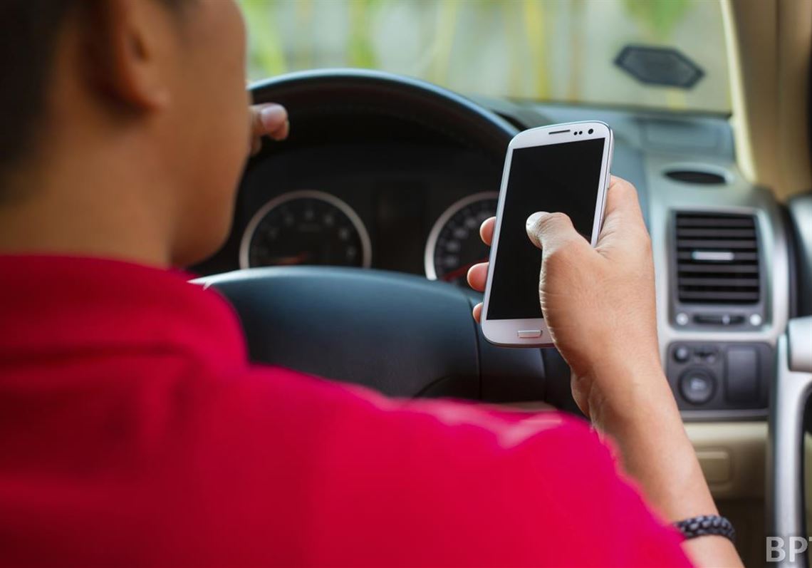 Put down the phone while driving | Pittsburgh Post-Gazette