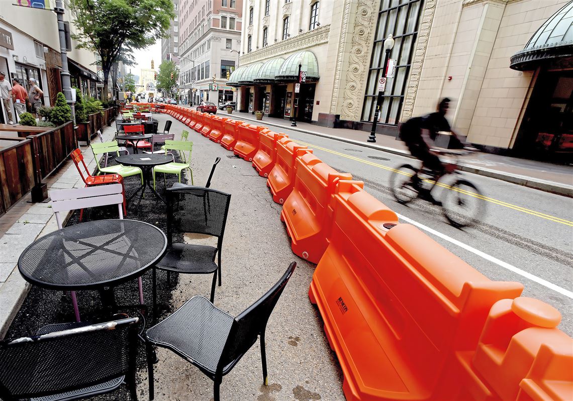 Downtown street and sidewalk space for dining is a good thing ...