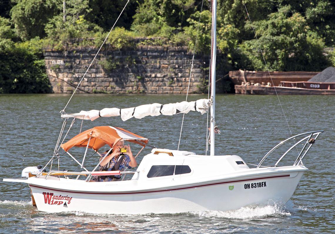 Ailing outboard shifts course of man sailing the length of the Ohio ...
