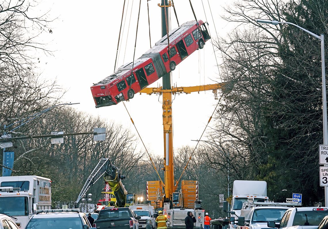 Crews hoist Port Authority bus, other vehicles from wreckage at site of ...