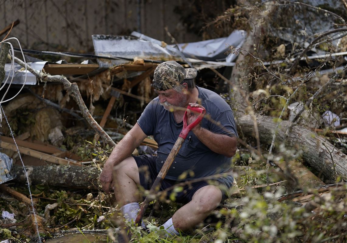'This is all I got': Families sift through destroyed homes as Laura ...