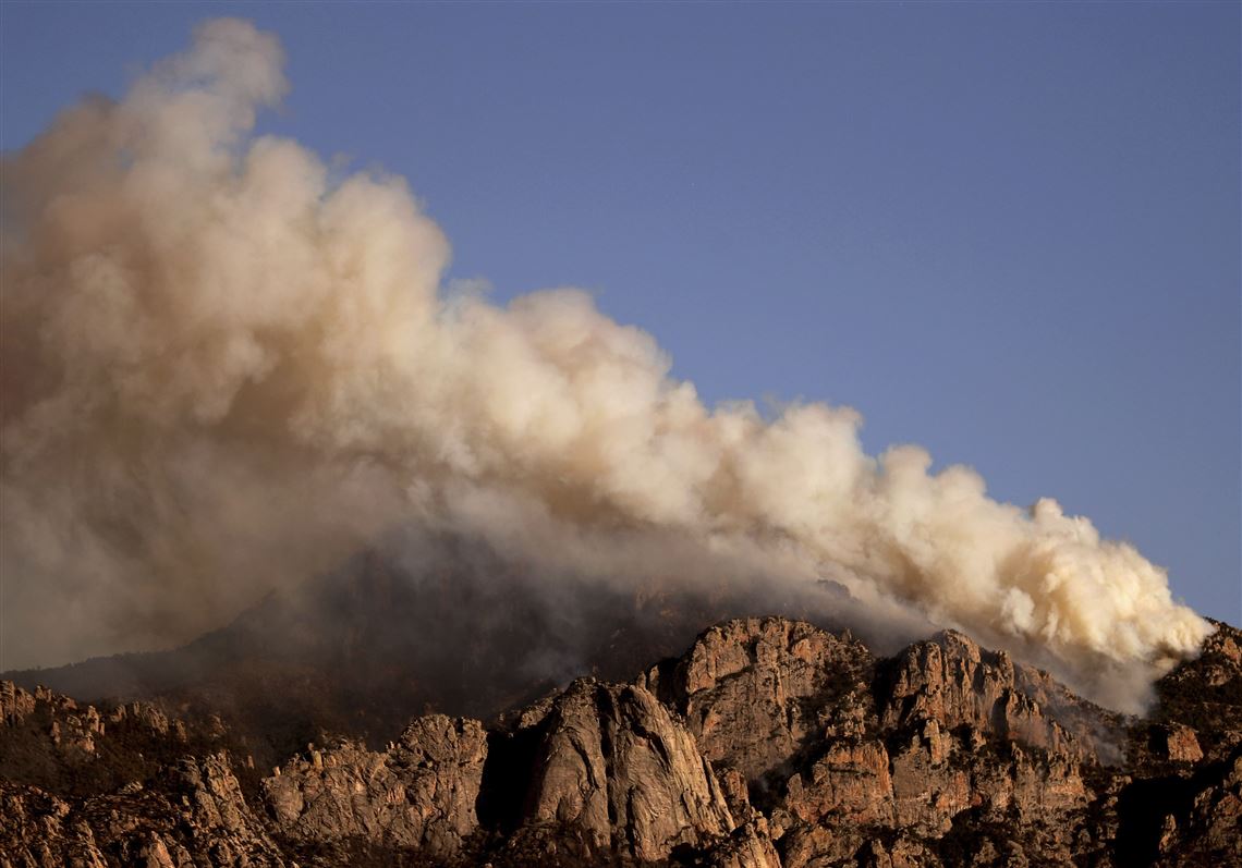 Arizona crews battling wildfire near Tucson say home threats down ...