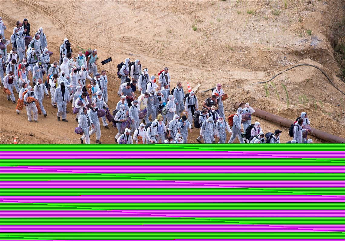 Protesters storm open-pit coal mine in western Germany | Pittsburgh ...