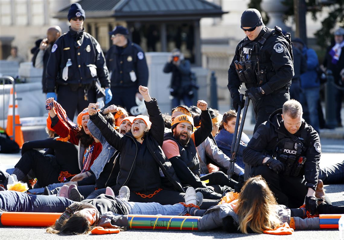 Behind the scenes of a protest, young undocumented immigrants display ...