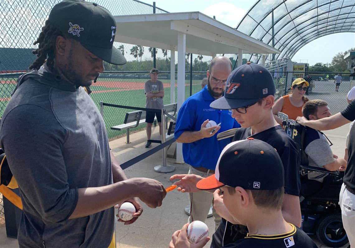 Josh Bell hits Pirates camp with excitement and a tweaked throwing ...