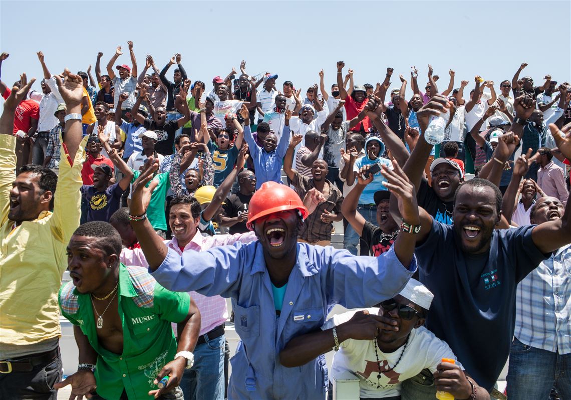 As migrant workers build Qatar’s World Cup stadiums, they dream of ...