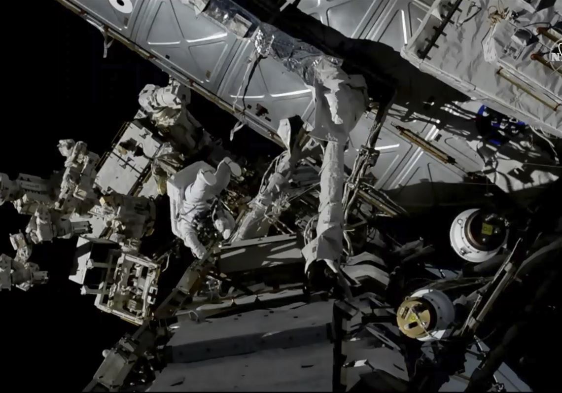 Spacewalking astronauts tackle battery and cable work | Pittsburgh Post ...