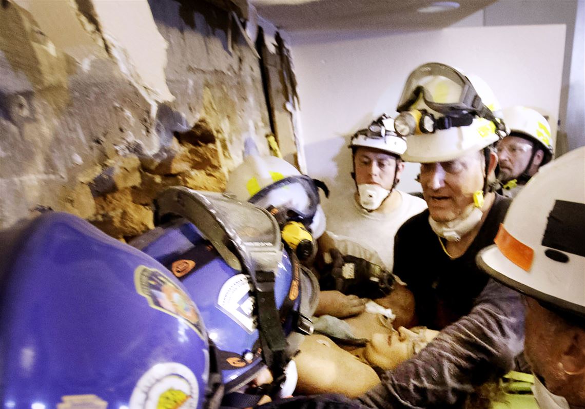 How hundreds of responders, refrigerator saved woman from collapsed ...