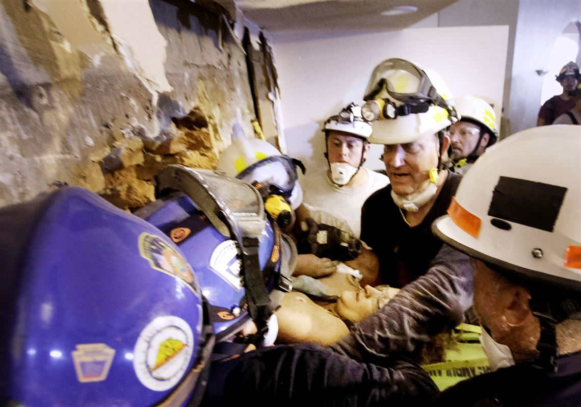 Rescuers faced danger and obstacles in freeing woman from collapsed ...